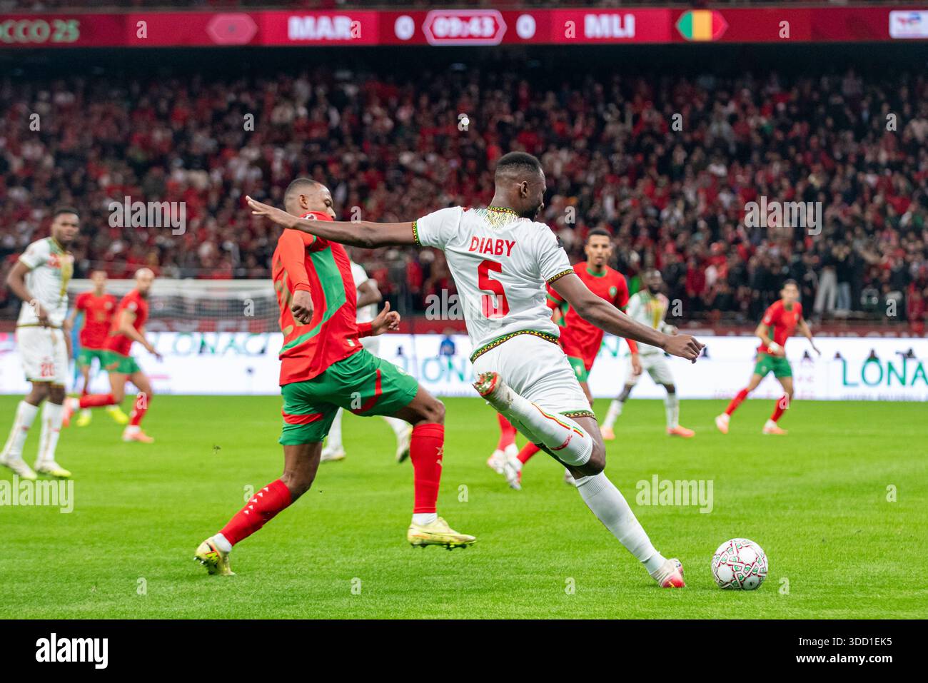 Ayoub El Kaabi of Morocco duels with Abdoulaye Diaby of Mali during the ...
