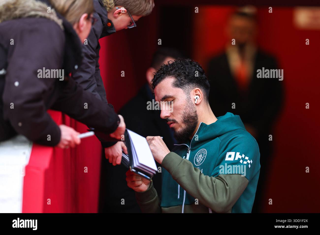 Rayan Ait-Nouri of Manchester City signs autographs before the ...
