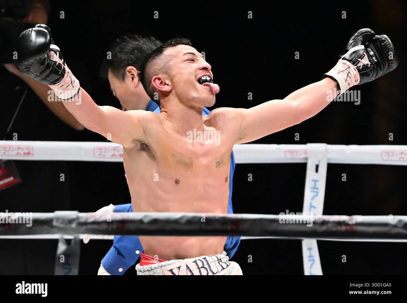 Masamichi Yabuki of Japan reacts after knocking Felix Pedro Alvarado ...