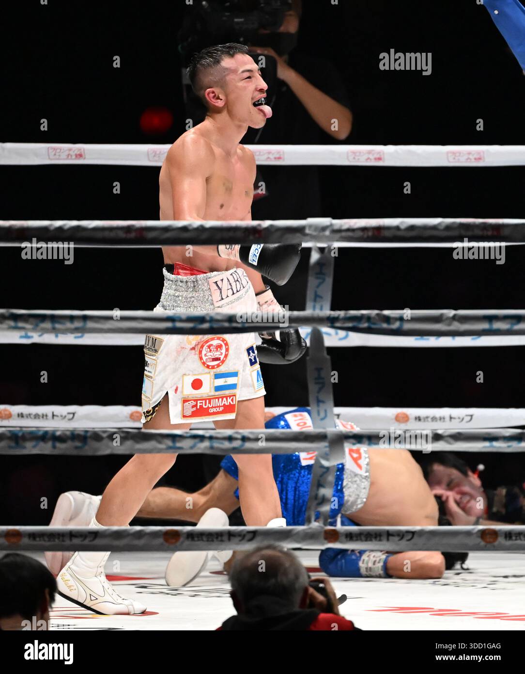 Masamichi Yabuki of Japan reacts after knocking Felix Pedro Alvarado ...