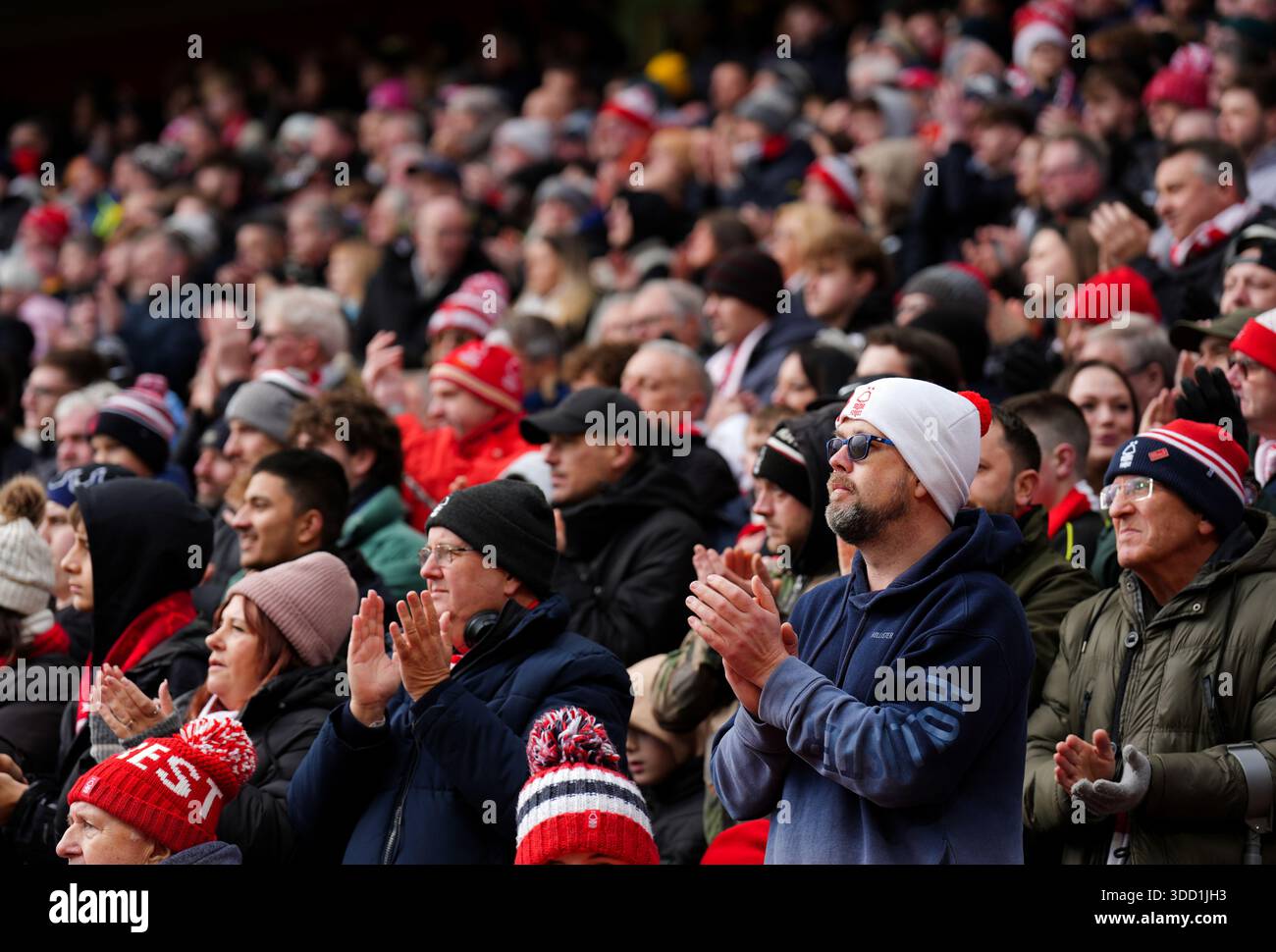 Nottingham Forest fans during a moments applause in memory of John ...