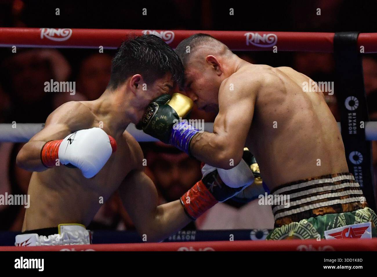 Sebastian Hernandez Reyes of Mexico, left, punches Japan's Junto ...