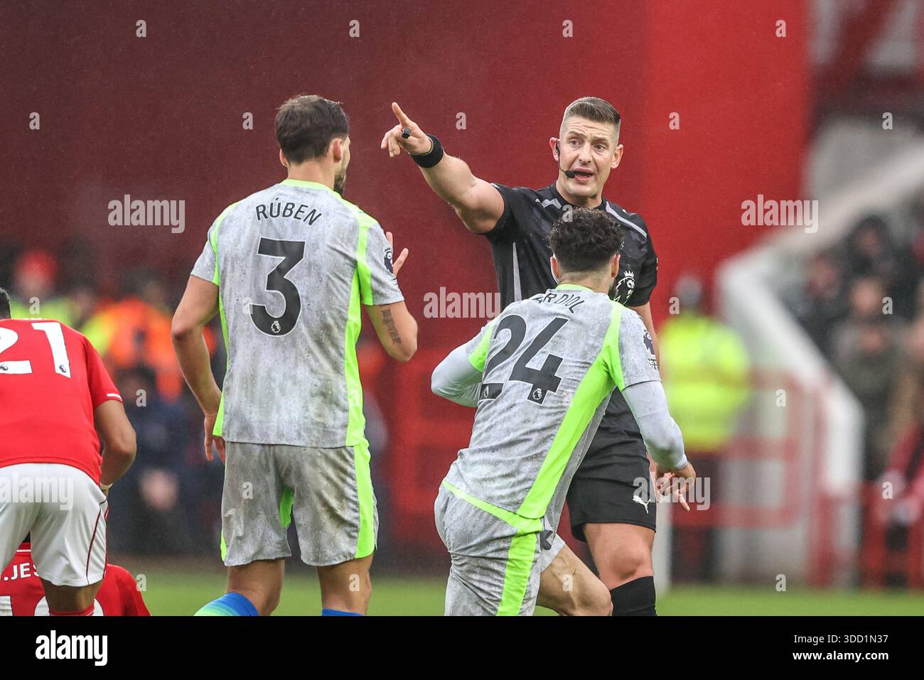 Referee Robert Jones gives instructions during the Premier League match ...