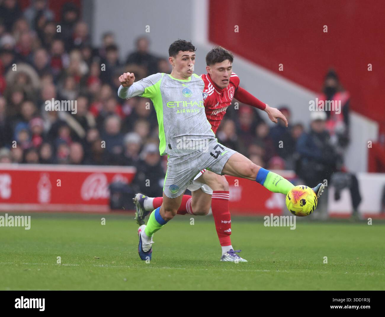 Phil Foden (MC) Nicolo Savona (NF) at the Nottingham Forest v ...