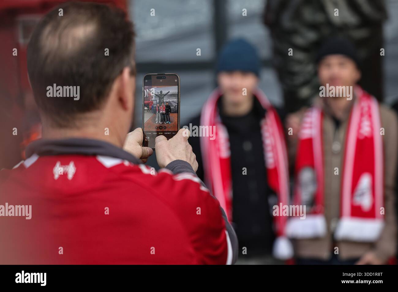 Liverpool fans take a selfie during the Premier League match Liverpool ...