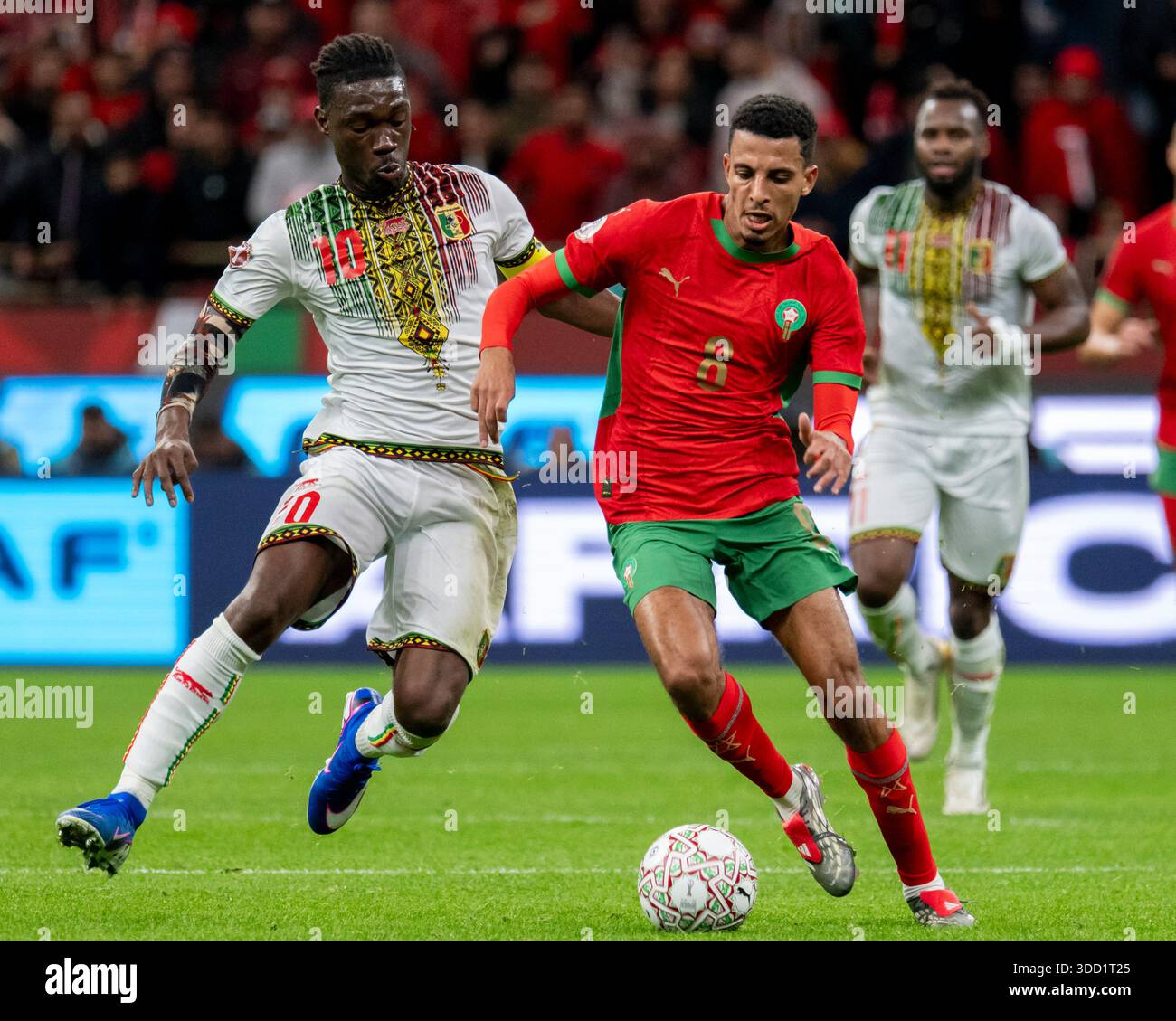 Yves Bissouma of Mali duels with Azzedine Ounahi of Morocco during the ...
