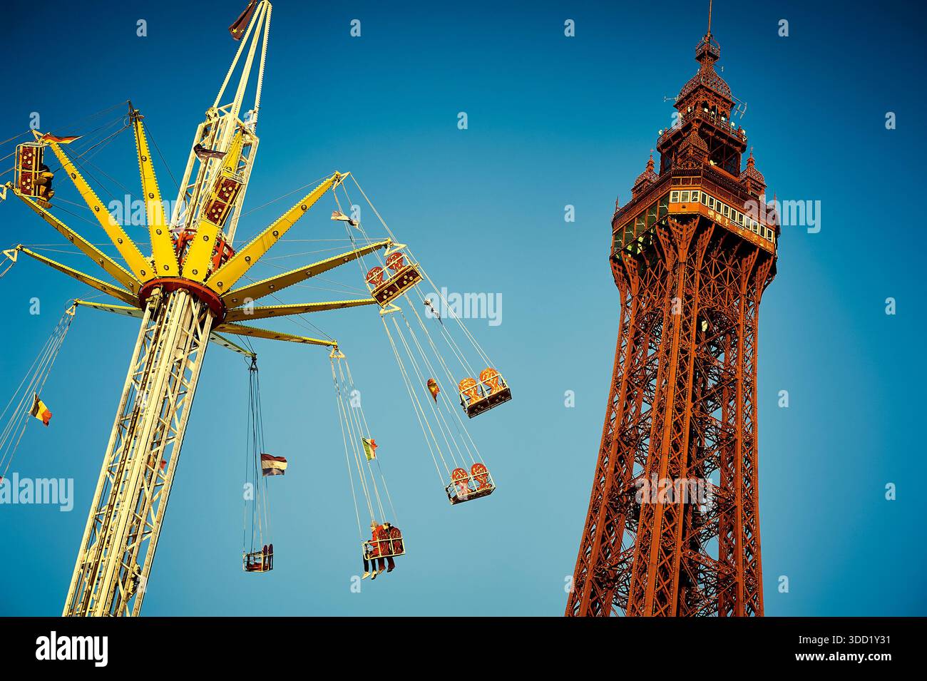 The 71 metre Star Flyer next to Blackpool Tower at Christmas by the sea ...
