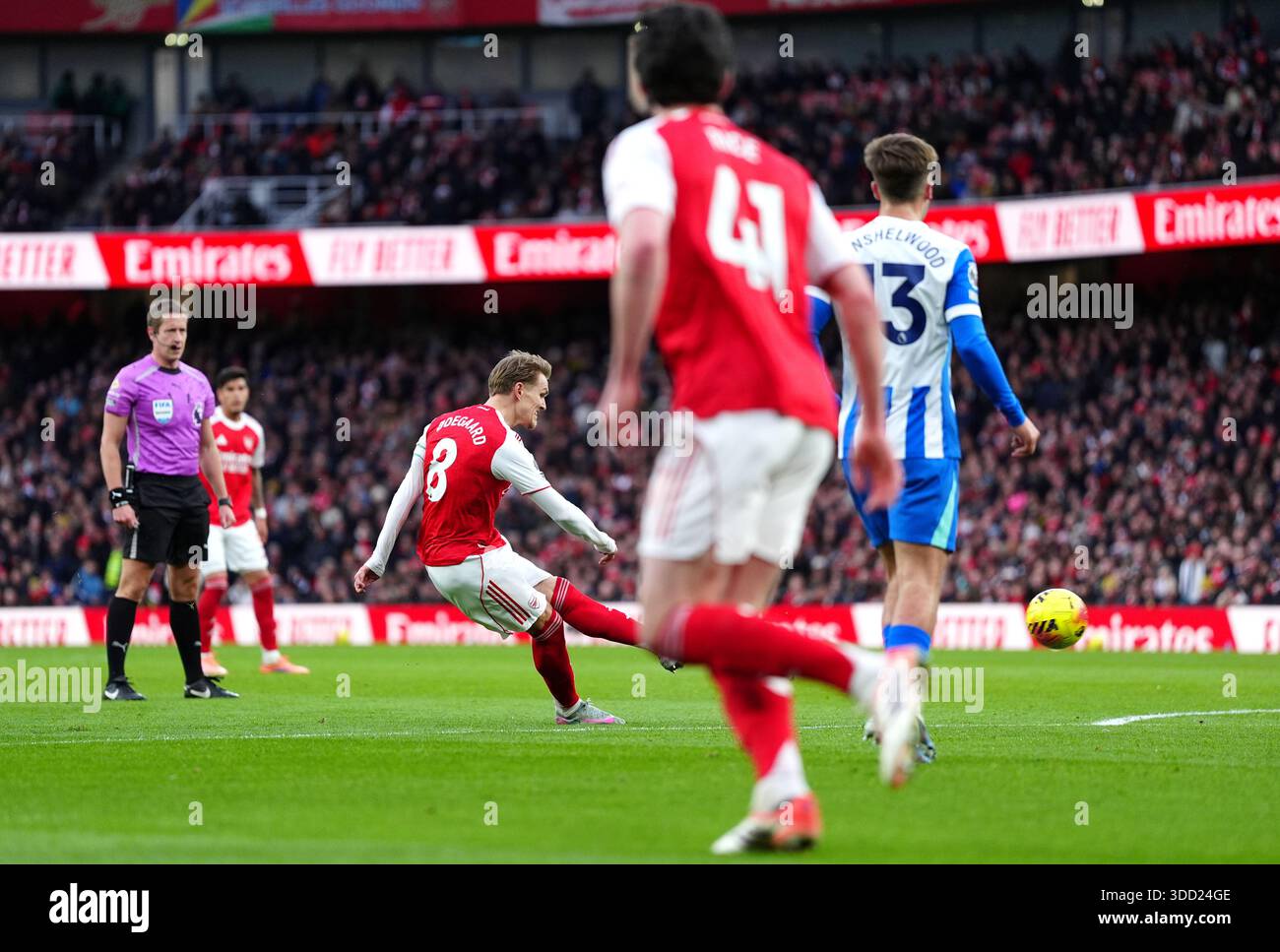 Arsenal's Martin Odegaard scores their side's first goal of the game ...