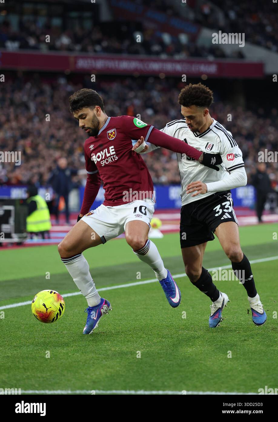 West Ham's Lucas Paquetá and Fulham's Antonee Robinson battle for the ...