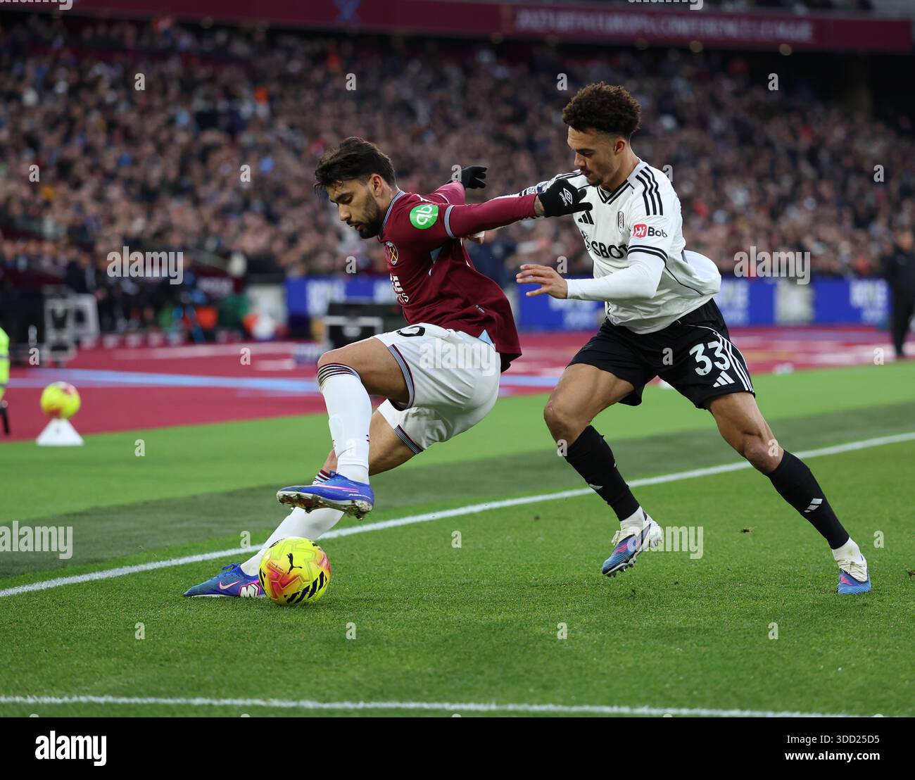 West Ham's Lucas Paquetá and Fulham's Antonee Robinson battle for the ...