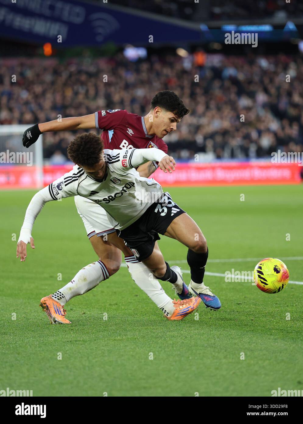 West Ham's Mateus Fernandes and Fulham's Antonee Robinson battle for ...