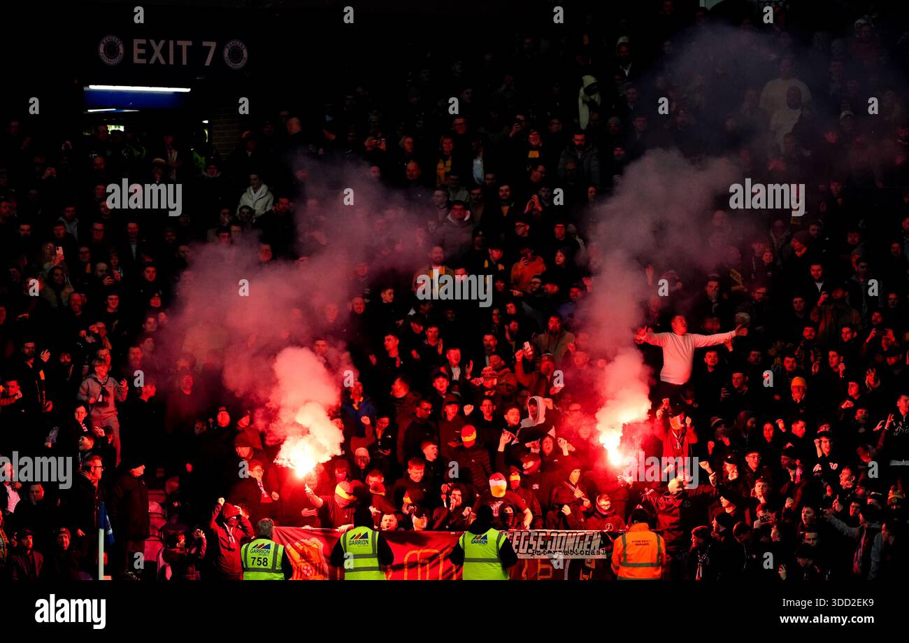 Motherwell fans with flares during the William Hill Premiership match ...