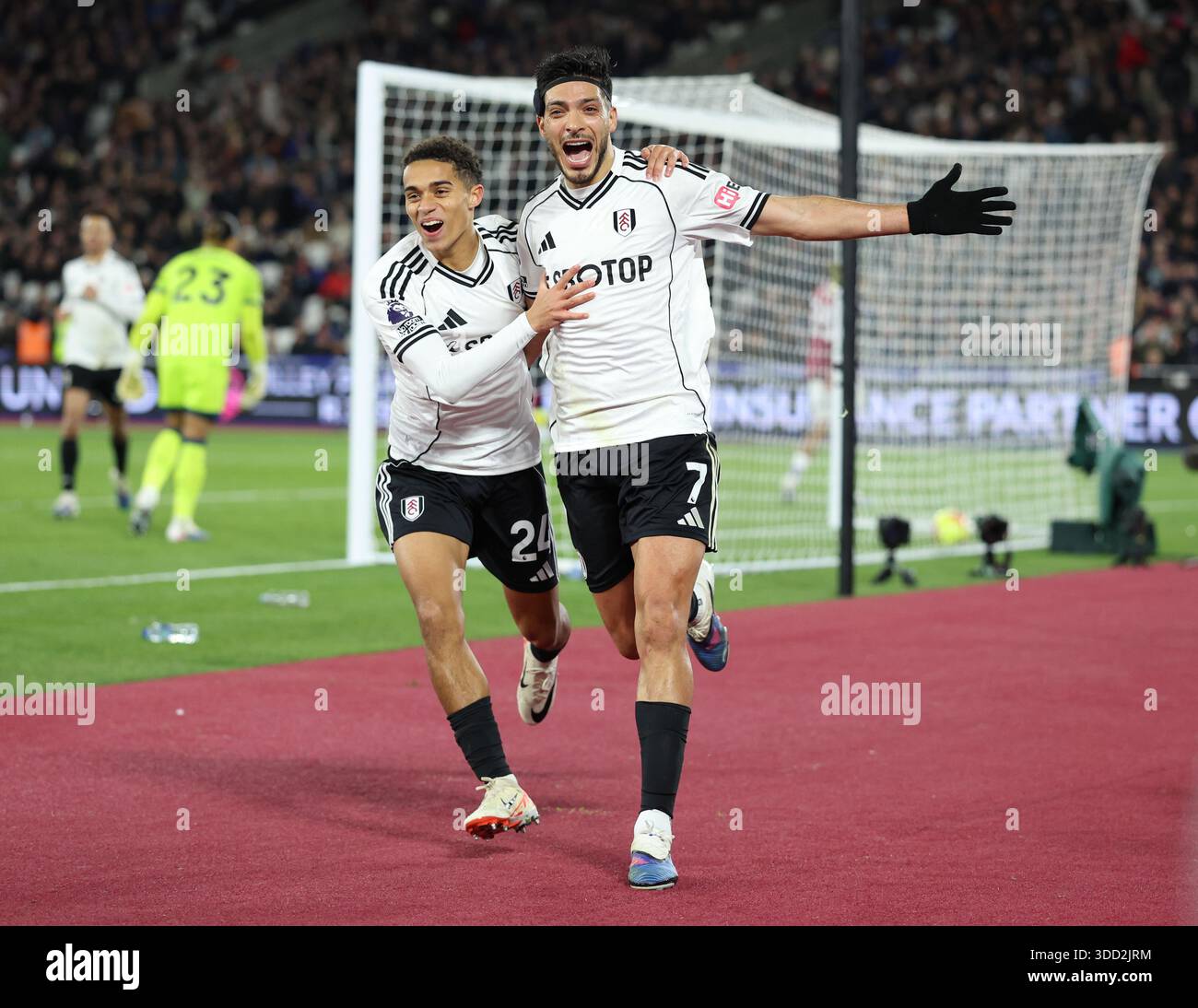Fulham's Joshua King (left) helps Raul Jimenez celebrate scoring his ...