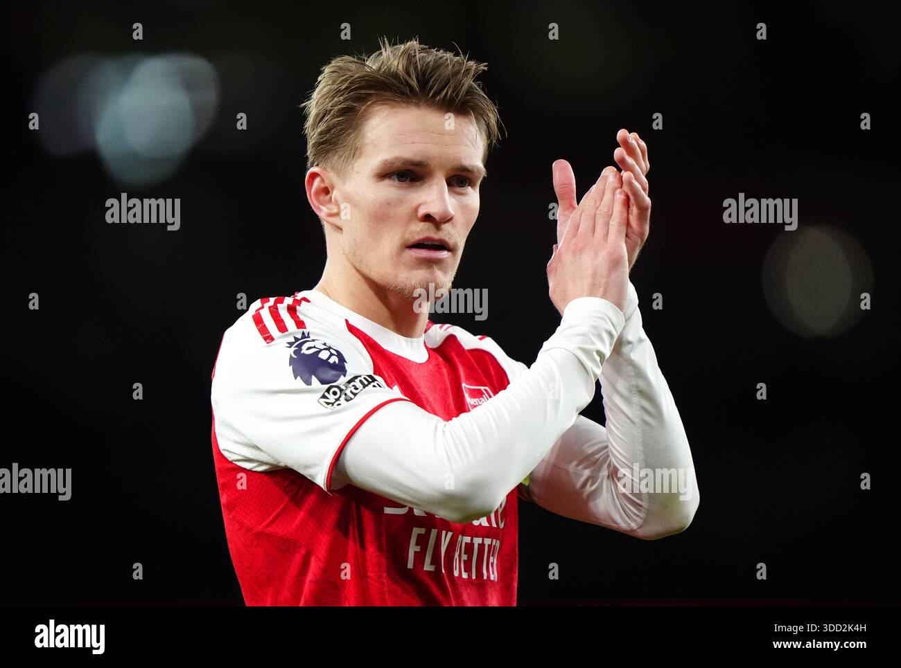 Arsenal's Martin Odegaard applauds the fans following the Premier ...