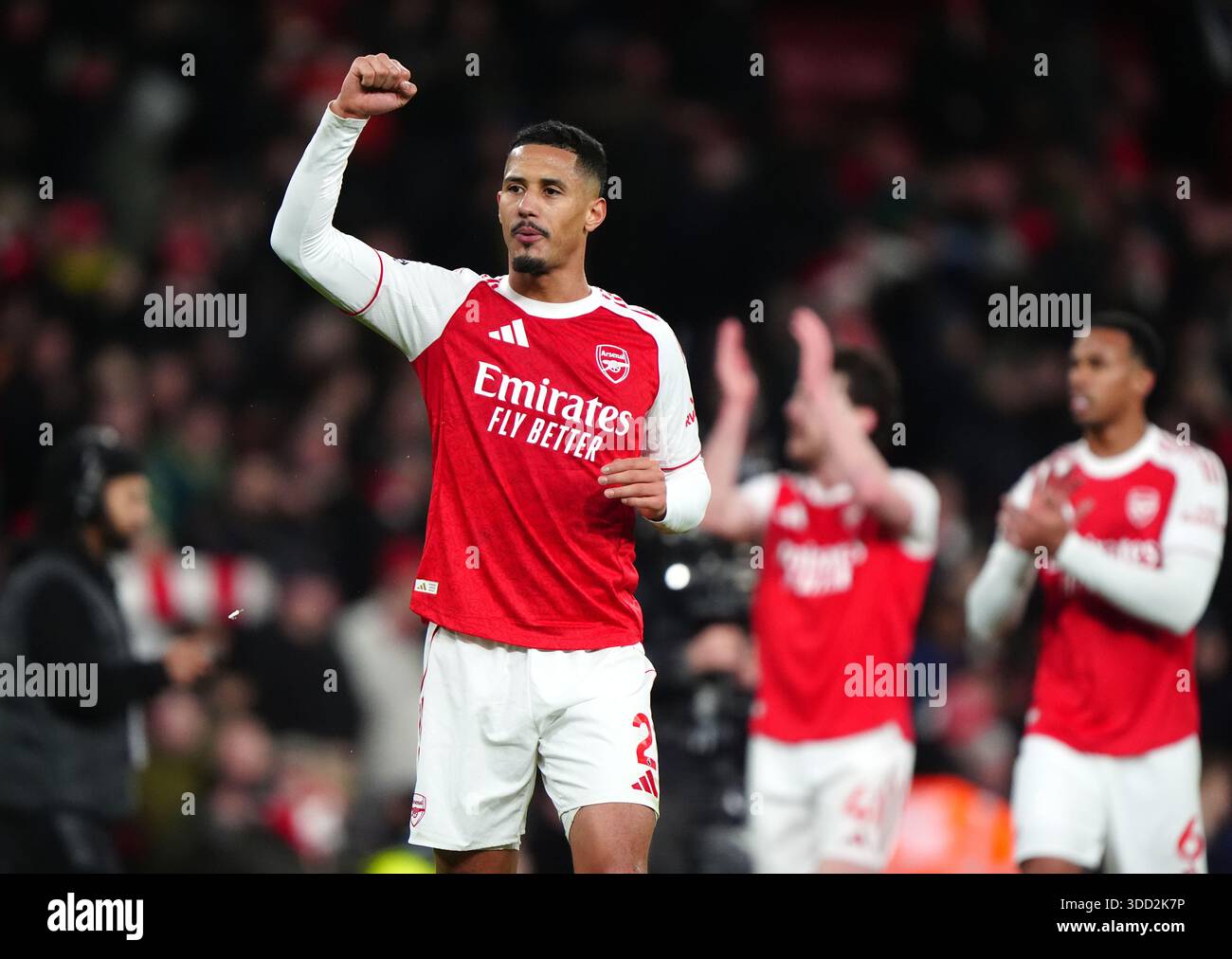 Arsenal's William Saliba salutes the fans following the Premier League ...