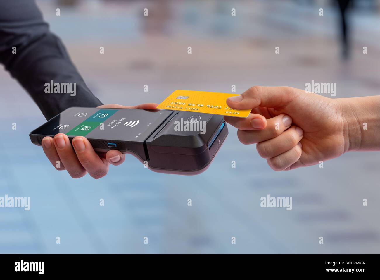 Customer inserts payment card into mobile POS terminal, illustrating ...