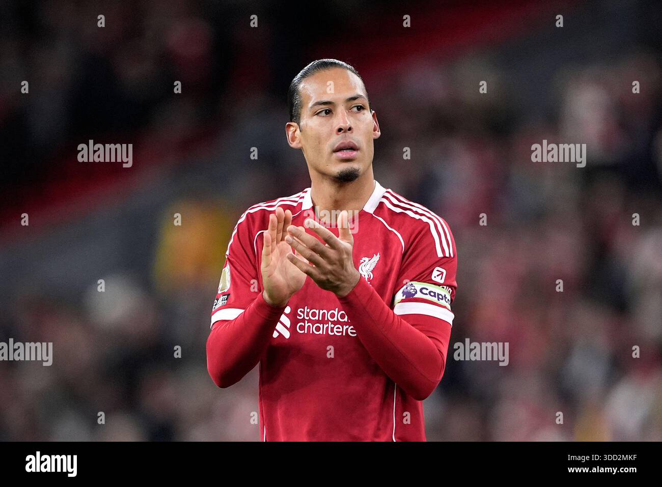 Liverpool's Virgil van Dijk applauds the fans following the Premier ...