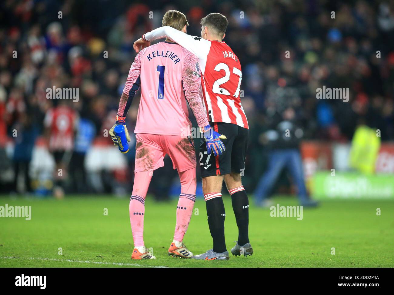 Brentford goalkeeper Caoimhin Kelleher (left) and team-mate Vitaly ...