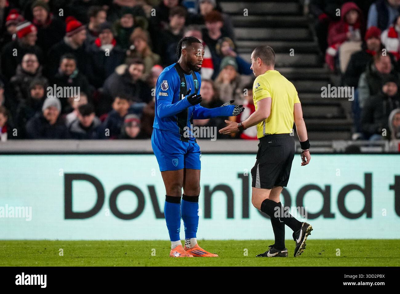 Referee Peter Bankes speaks to Antoine Semenyo of Bournemouth during ...