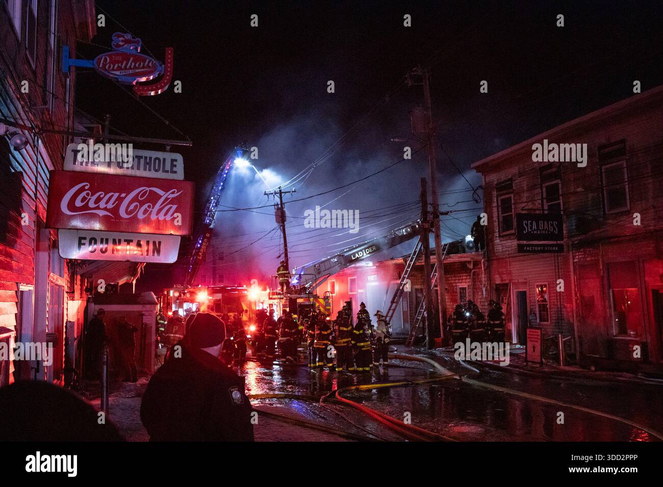 Firefighters battle a three-alarm fire on the historic Old Port ...