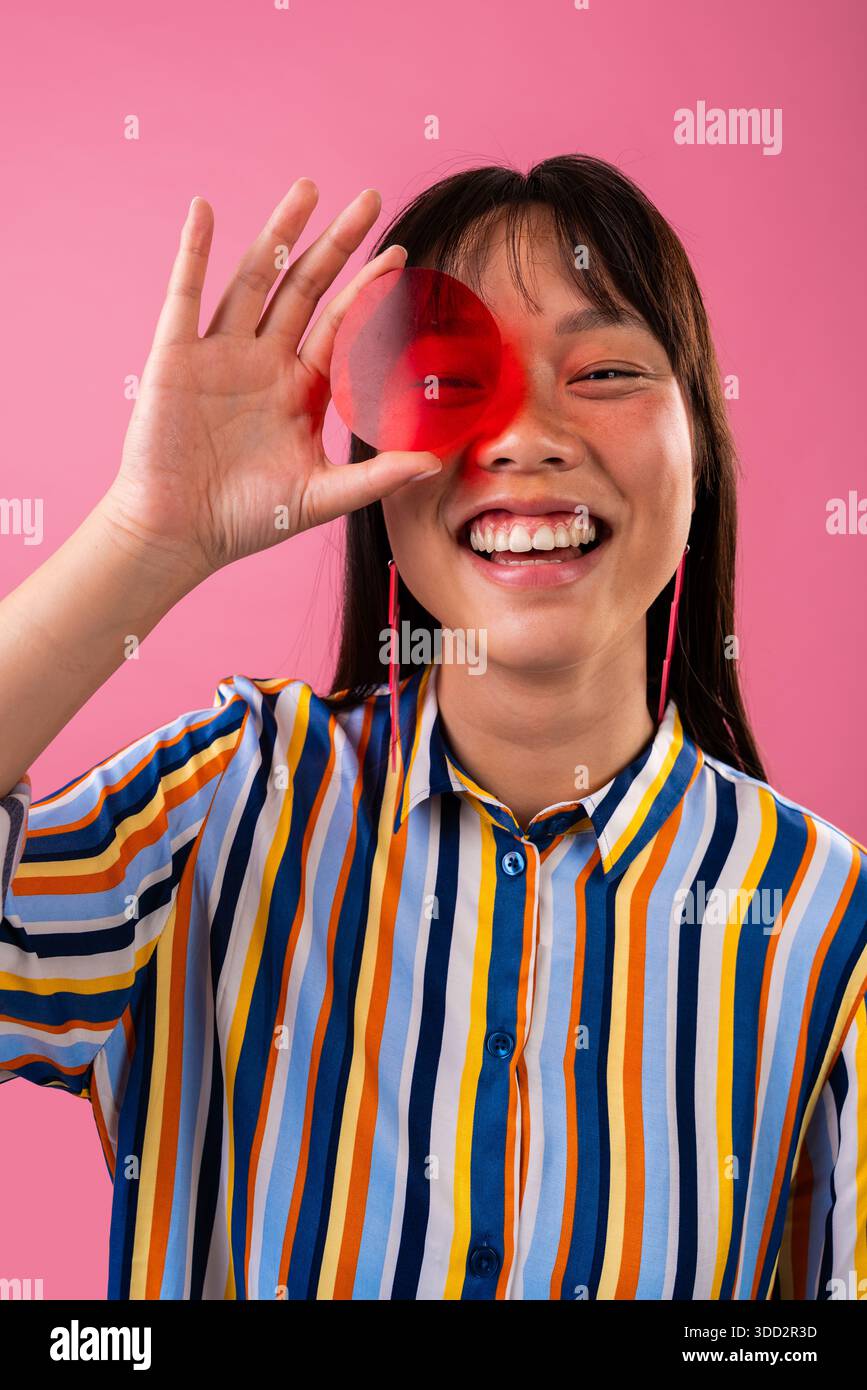 Beautiful chinese woman portrait on colorful background. Young asian ...