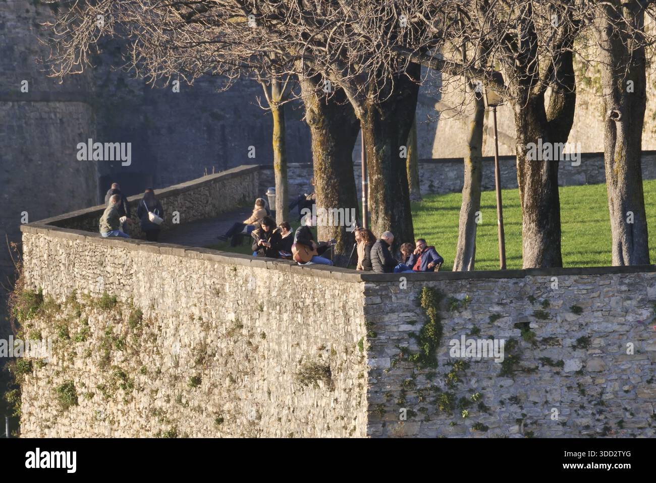 Clear skies return, and numerous tourists wander through the ...
