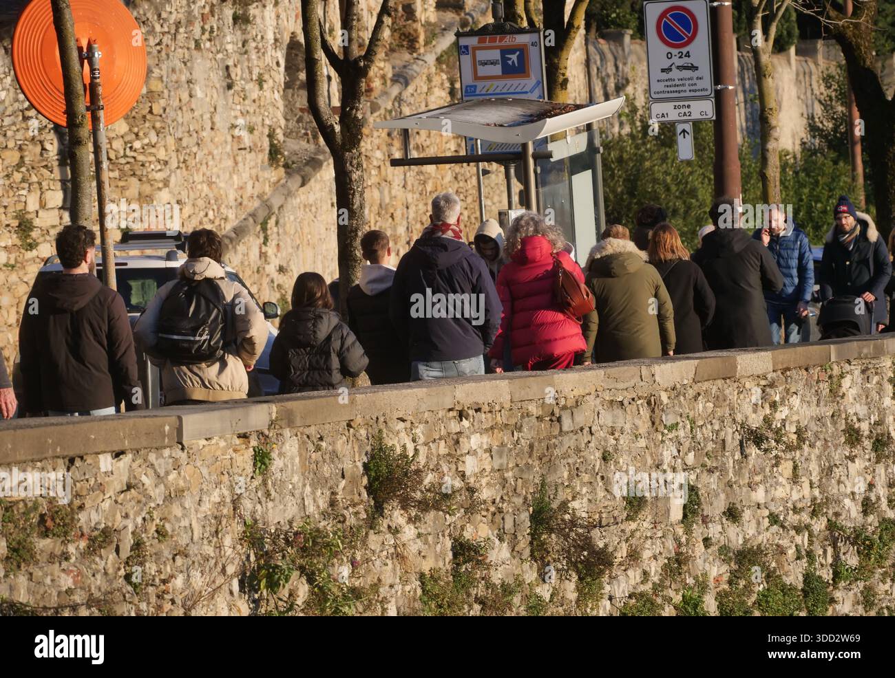 Clear skies return, and numerous tourists wander through the ...