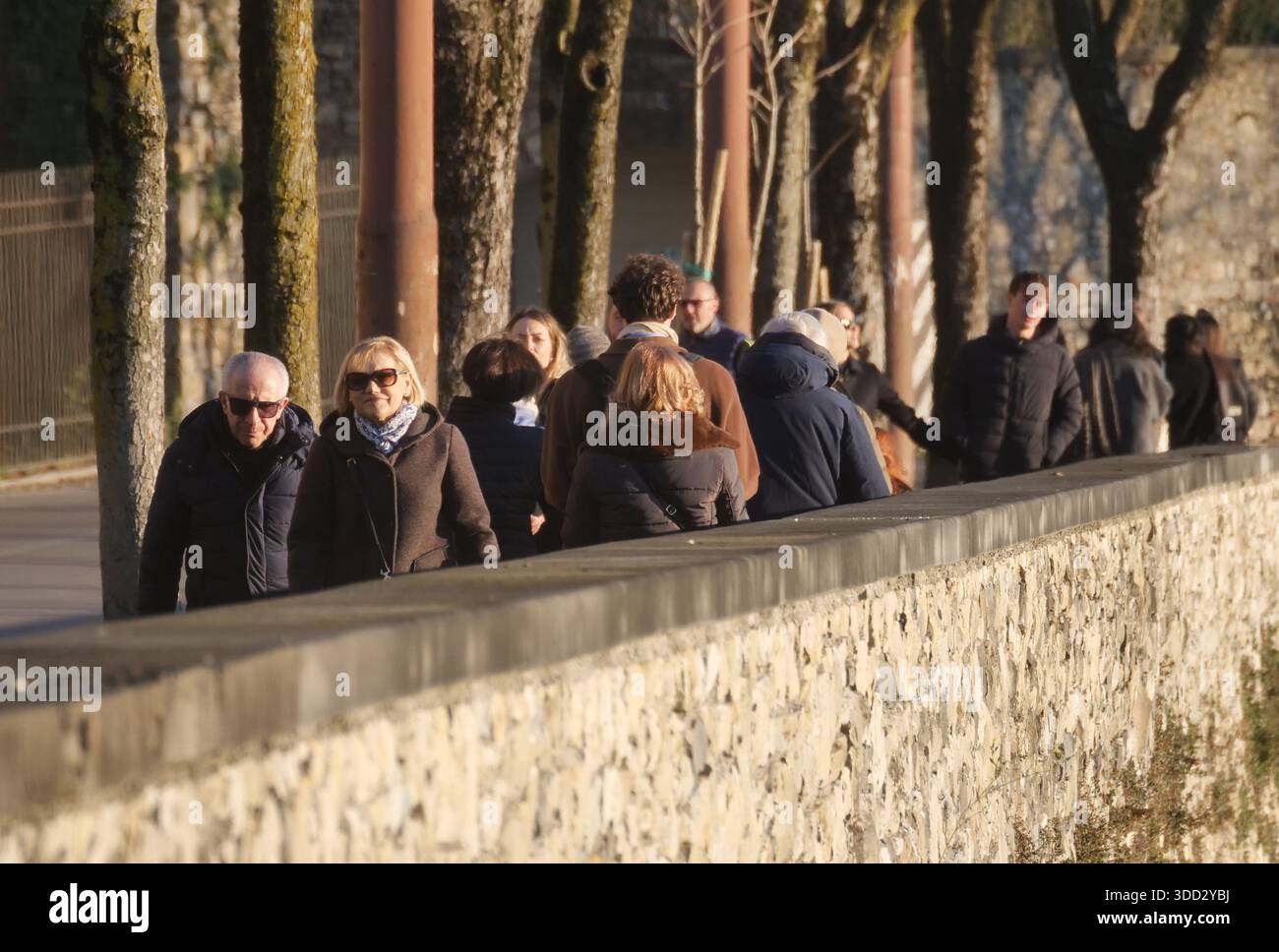 Clear skies return, and numerous tourists wander through the ...