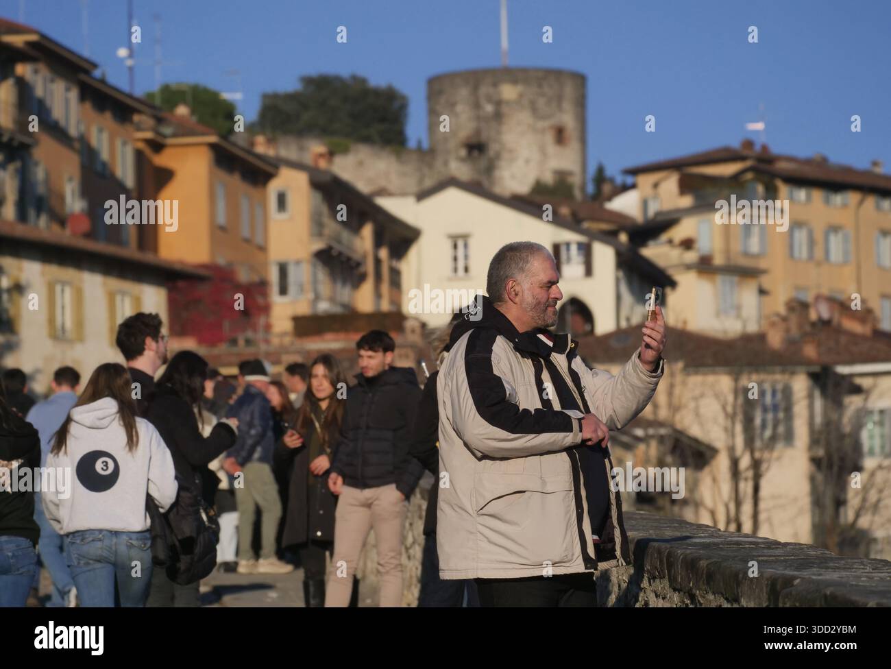 Clear skies return, and numerous tourists wander through the ...