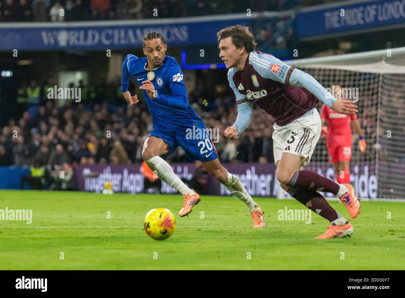 João Pedro of Chelsea puts pressure on Victor Lindelöf of Aston Villa ...