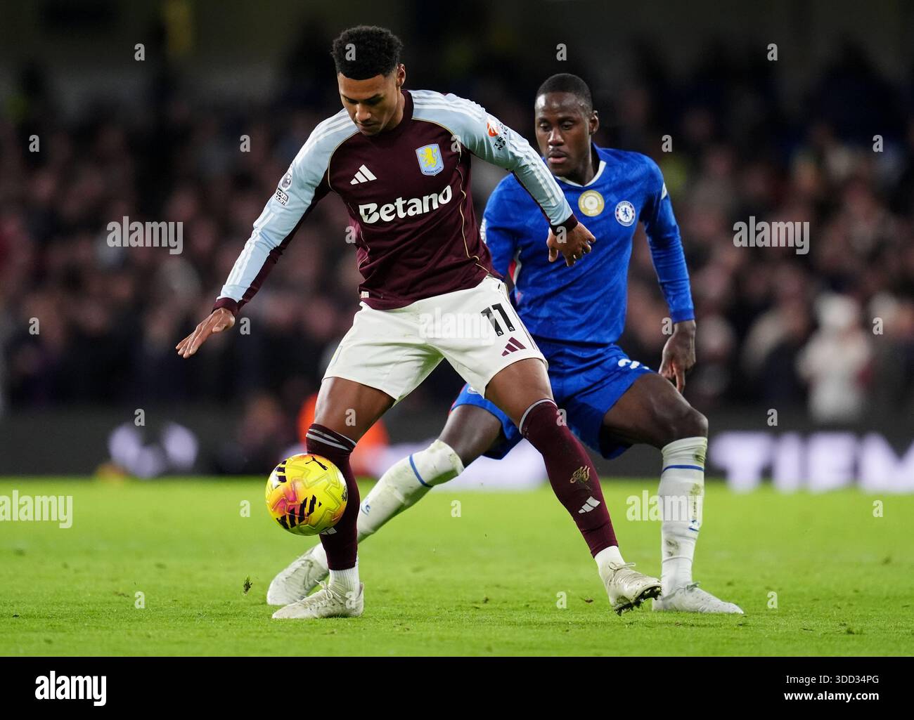 Aston Villa's Ollie Watkins (left) and Chelsea's Trevoh Chalobah battle ...