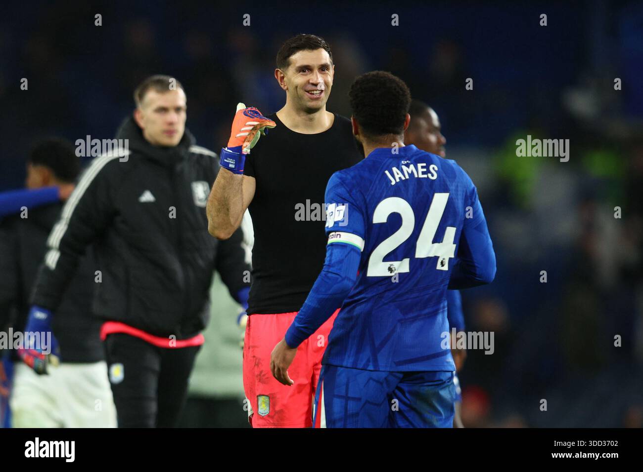 LONDON, UK - 27th Dec 2025: Emiliano Martinez of Aston Villa with Reece ...