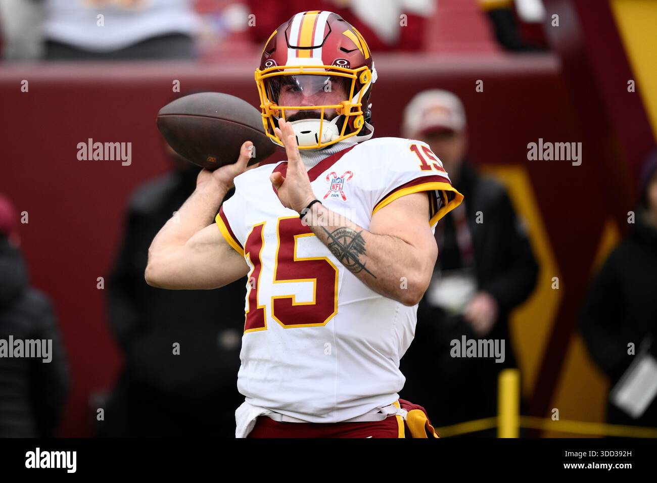 Washington Commanders quarterback Sam Hartman (15) warms up before an ...