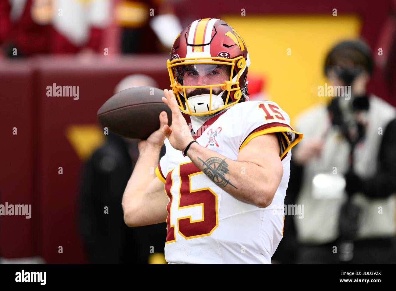 Washington Commanders quarterback Sam Hartman (15) warms up before an ...