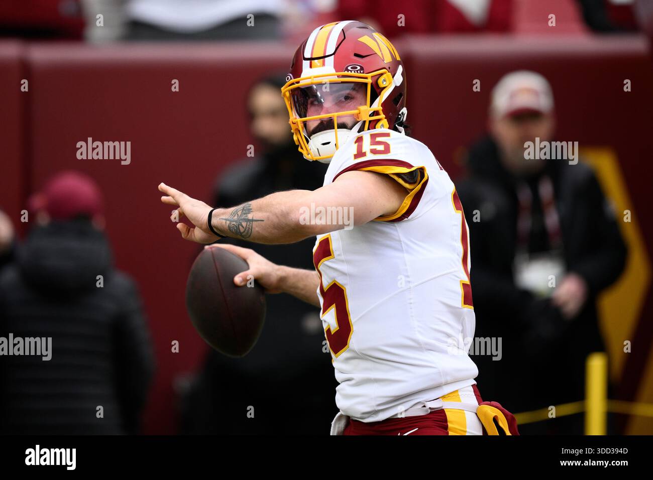Washington Commanders quarterback Sam Hartman (15) warms up before an ...