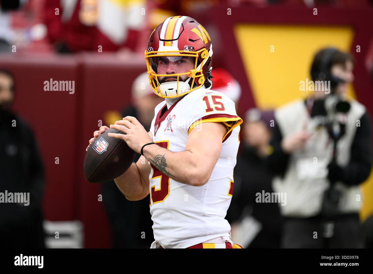 Washington Commanders quarterback Sam Hartman (15) warms up before an ...