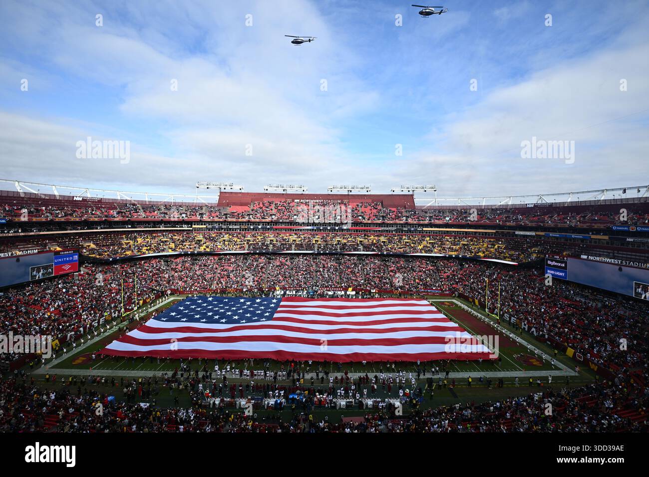 A United States flag is unfurled on the field in this general view of ...