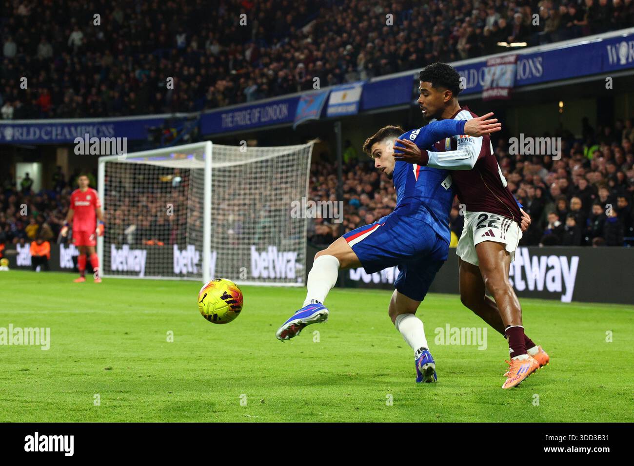 LONDON, UK - 27th Dec 2025: Pedro Neto of Chelsea holds off the ...