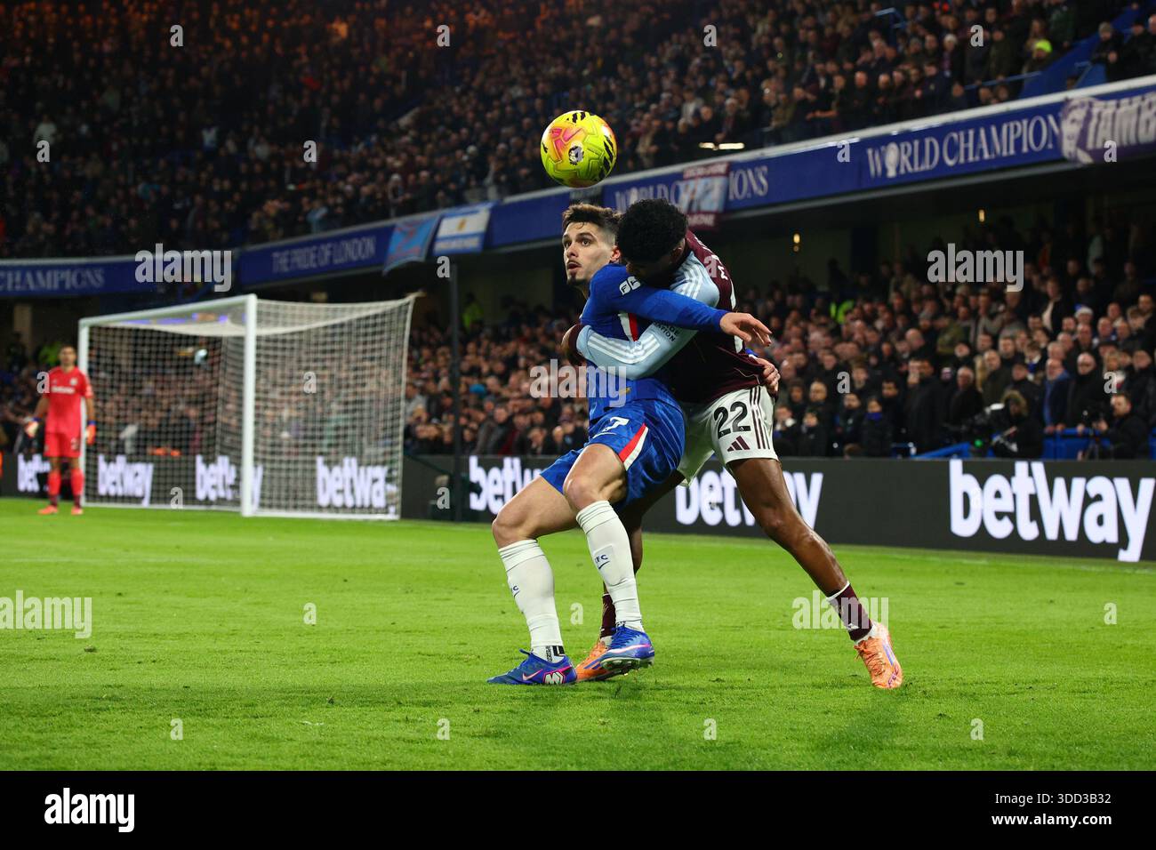 LONDON, UK - 27th Dec 2025: Pedro Neto of Chelsea holds off the ...