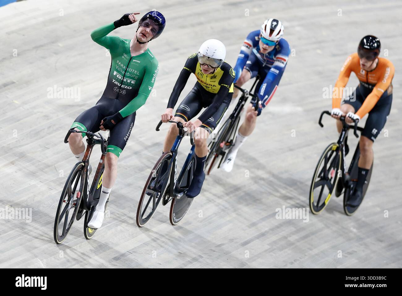 APELDOORN - Philip Heijnen celebrates after winning the points race at ...
