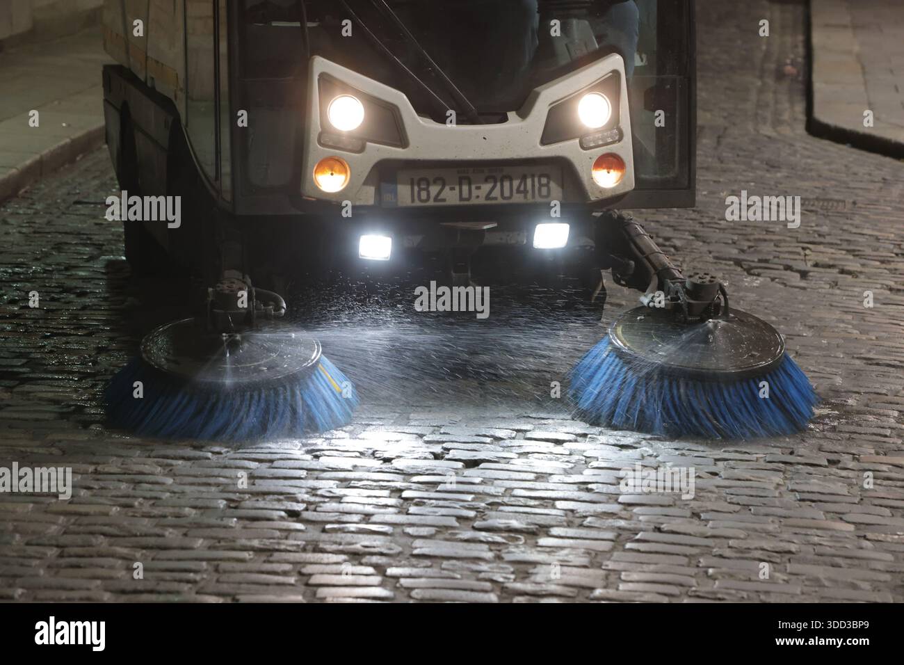 Dublin, Ireland - 24th December 2025 - A street weeping van with ...