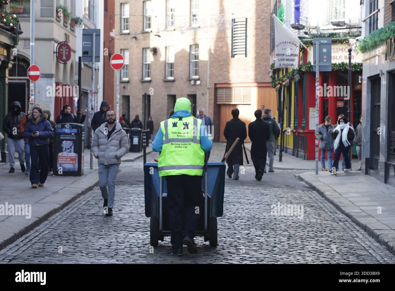 Dublin, Ireland - 24th December 2025 - A council waste collector with ...