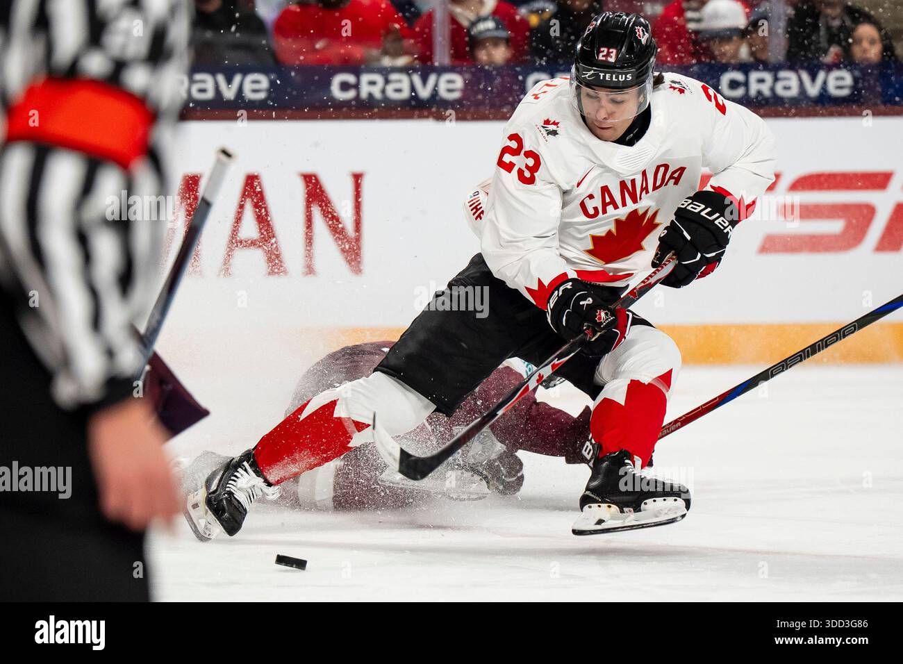 Canada's Sam O'Reilly (23) attacks the net during first-period IIHF ...