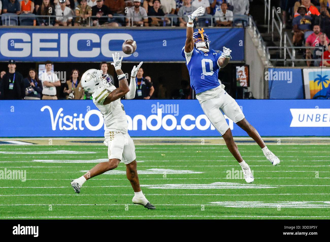 Georgia Tech wide receiver Eric Rivers, left, catches a pass over BYU ...