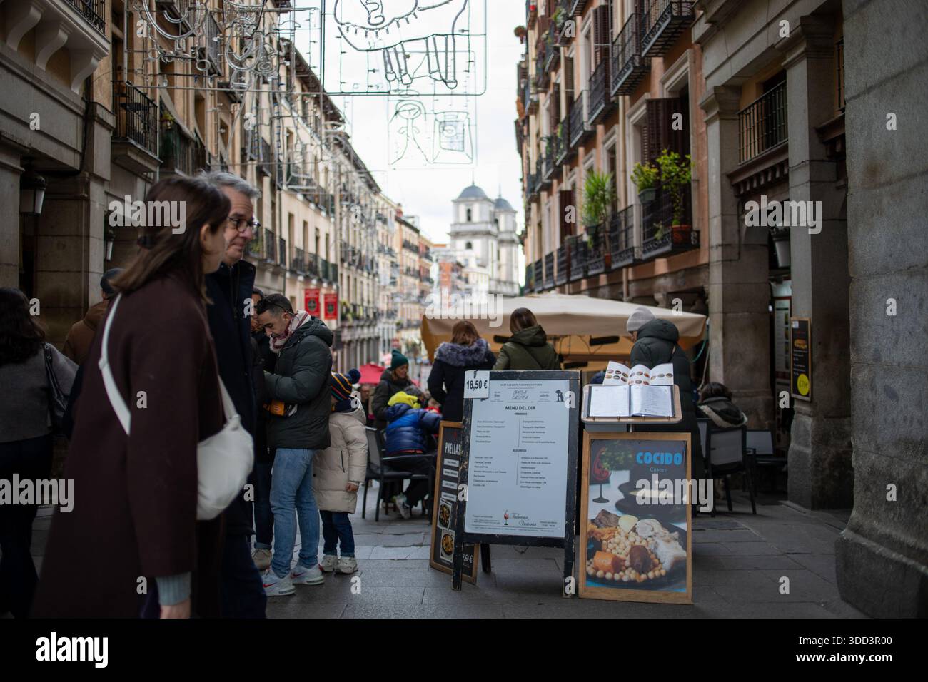 A sign for a restaurant in Madrid's Plaza Mayor advertises the ...