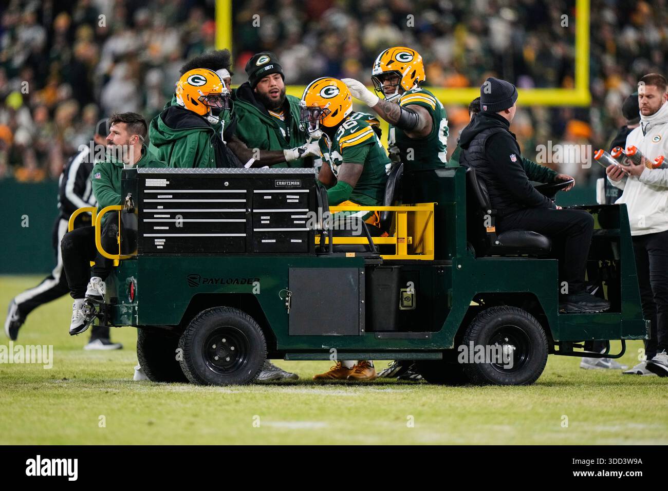 Green Bay Packers cornerback Kamal Hadden (36) is comforted by ...