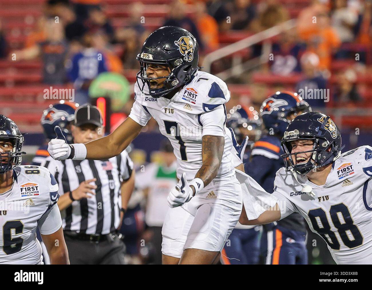 December 26, 2025: FIU's Kyle McNeal (7) celebrates his touchdown ...
