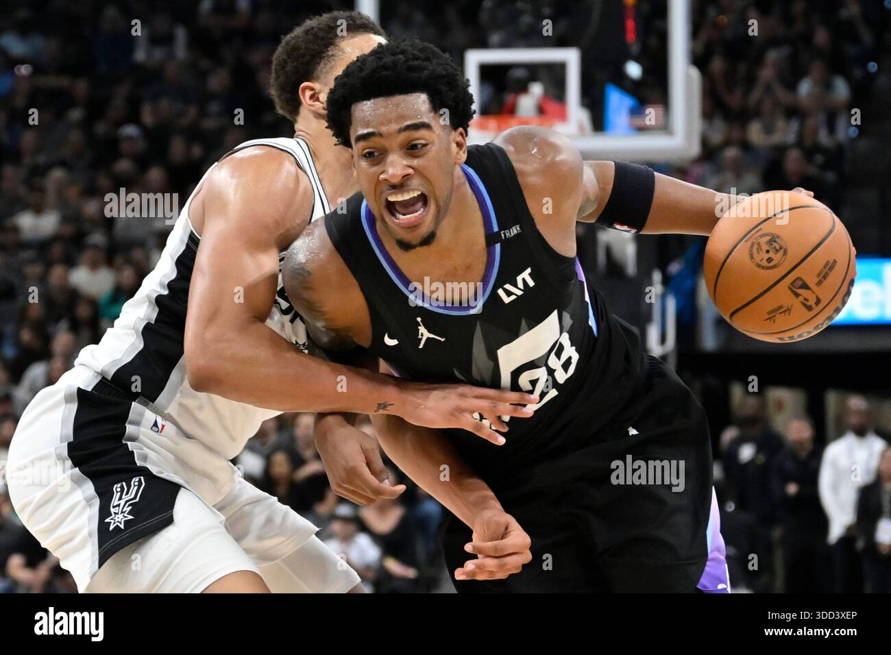 Utah Jazz guard Brice Sensabaugh (28) drives against San Antonio Spurs ...