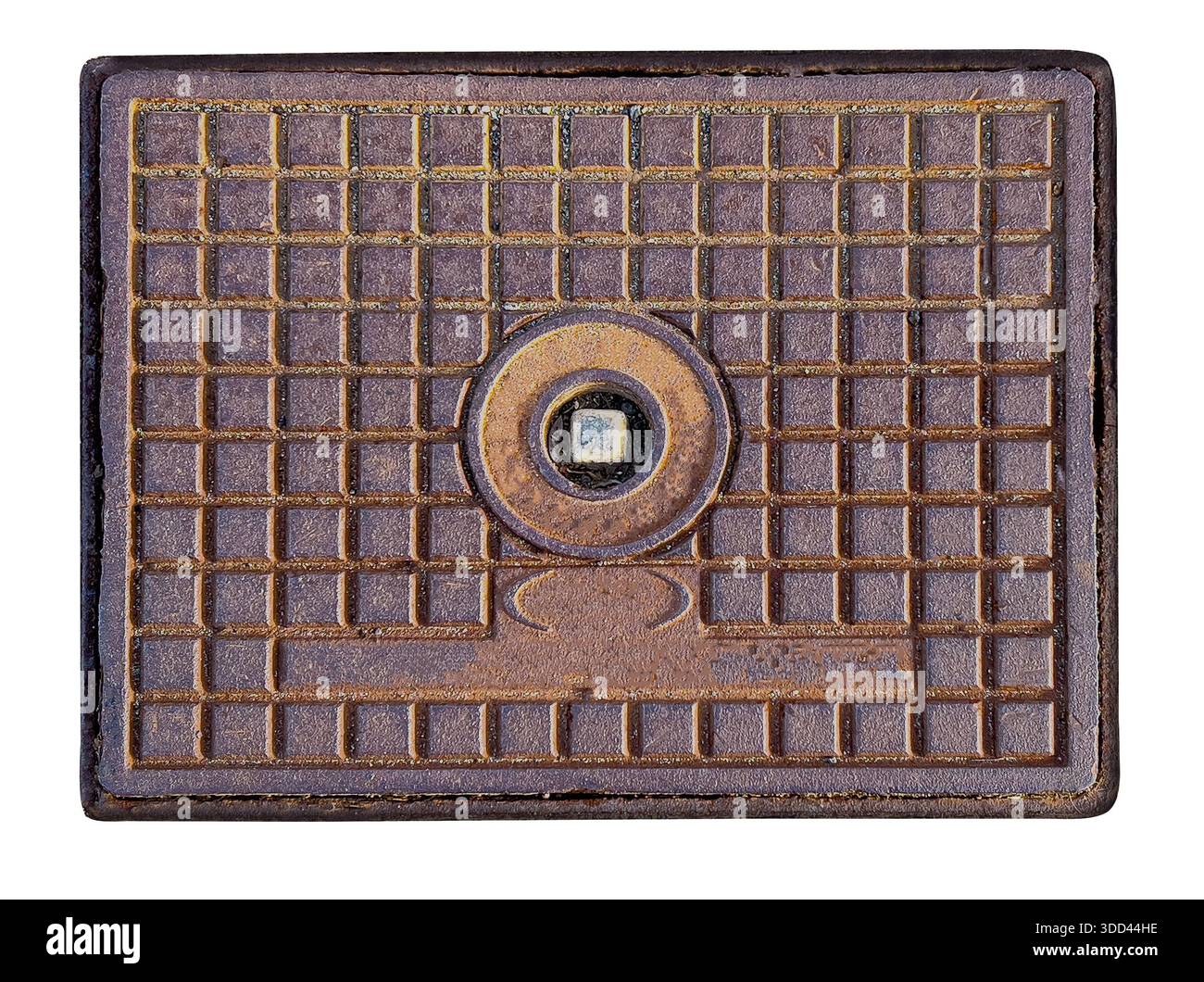 Rusty cast iron rectangular manhole cover with a square grid and ...