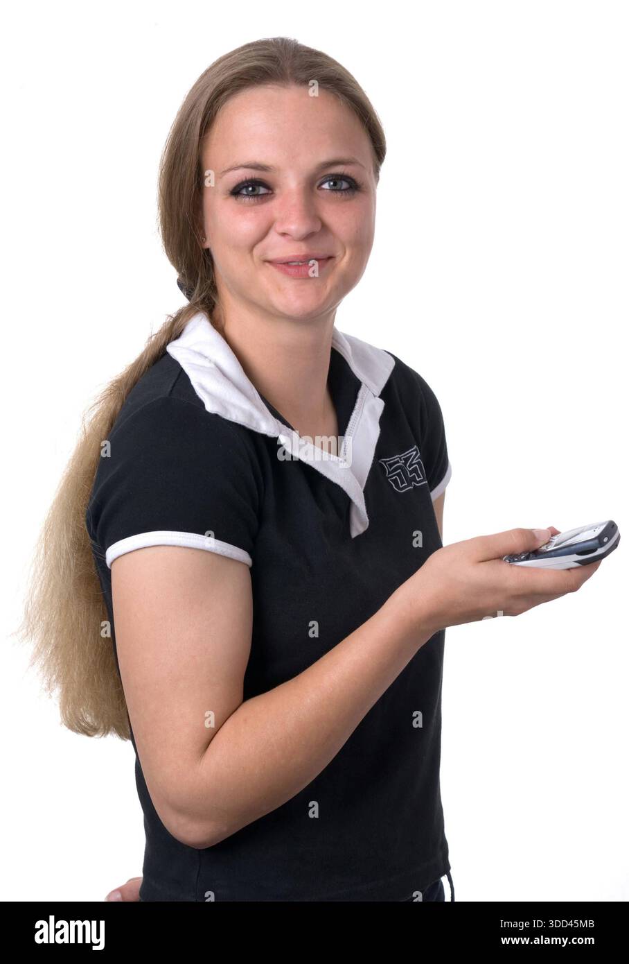 Junge Frau telefoniert mit 2 Handys Junge Frau mit Smartphone *** Young ...